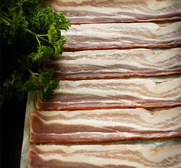 Pølser og Bacon - Thomsen Food Line A/S